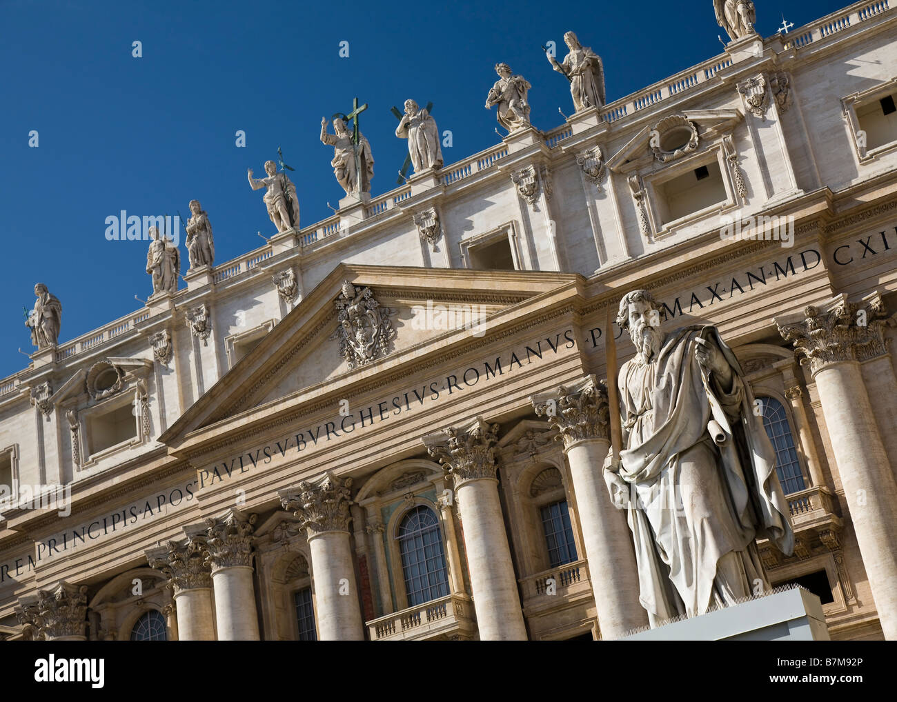 Looking up at the statues and architecture surrounding St Peter's ...