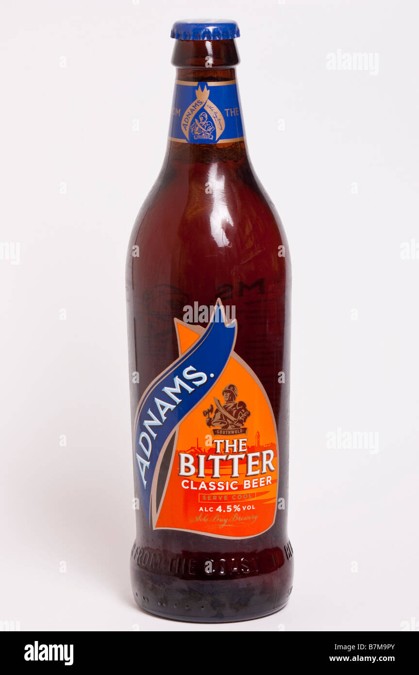 A close up of a bottle of Adnams the bitter classic beer on a white ...
