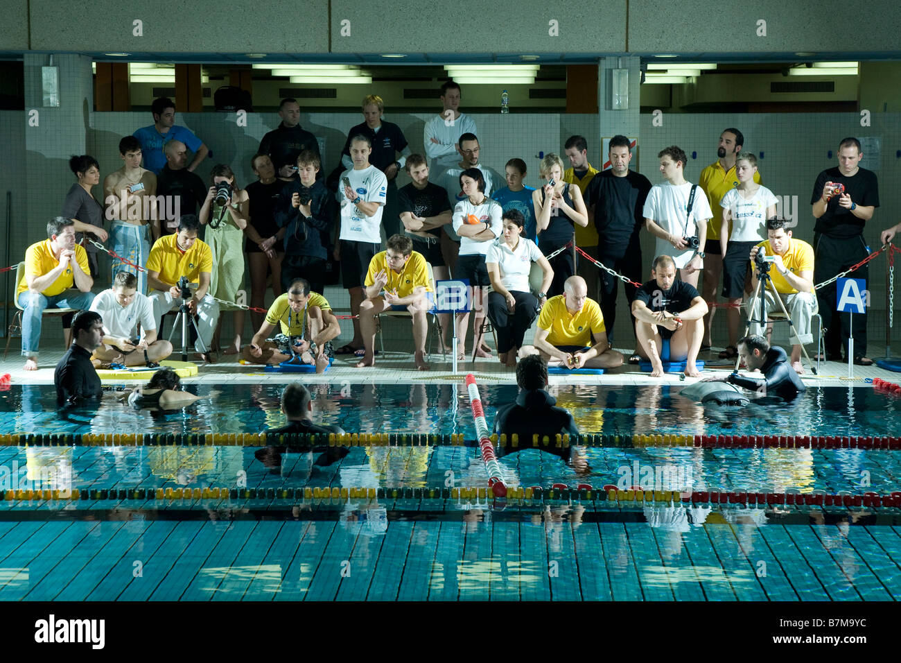 Group of witness during static apnea performance Stock Photo - Alamy