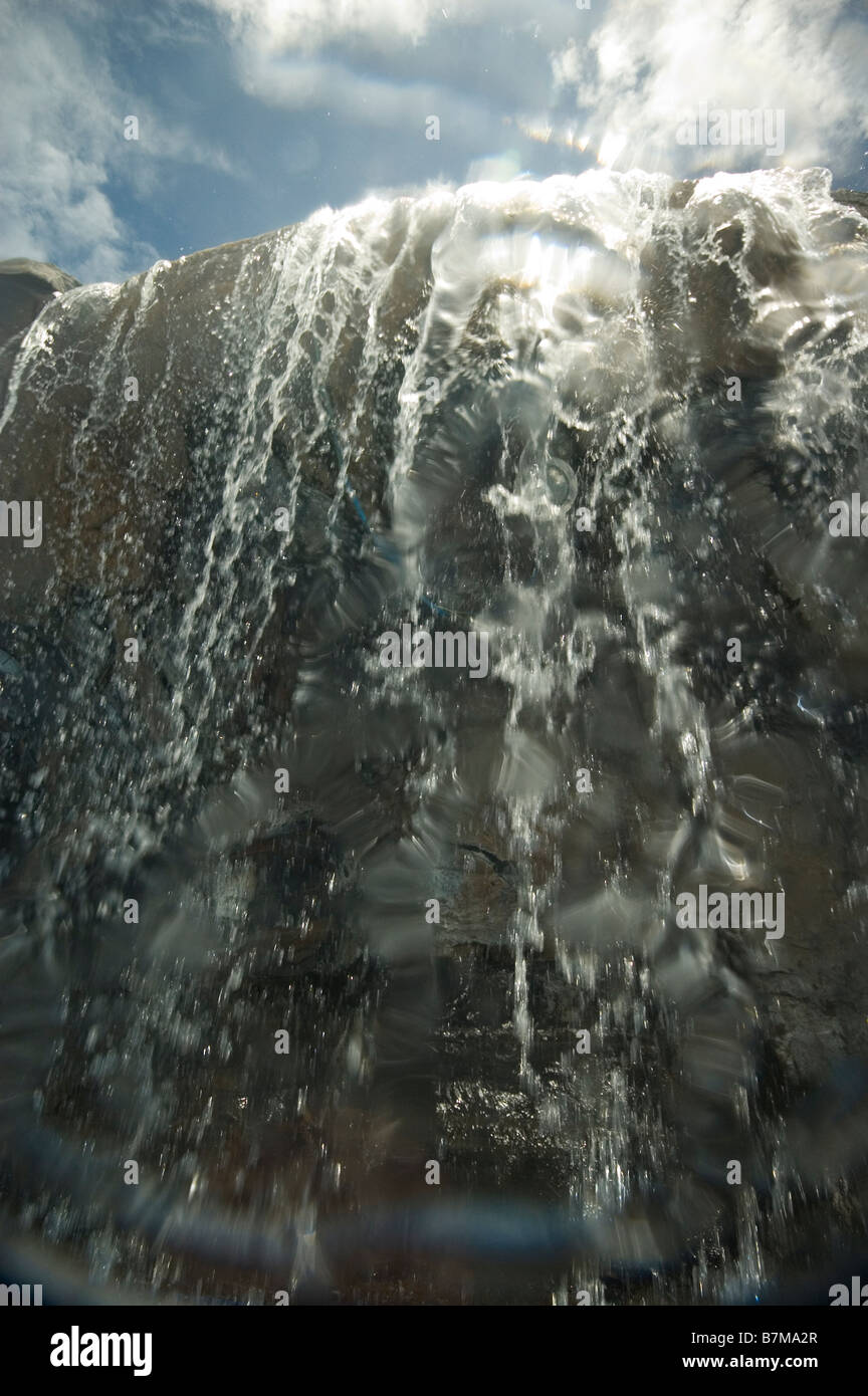 under a waterfall Stock Photo - Alamy