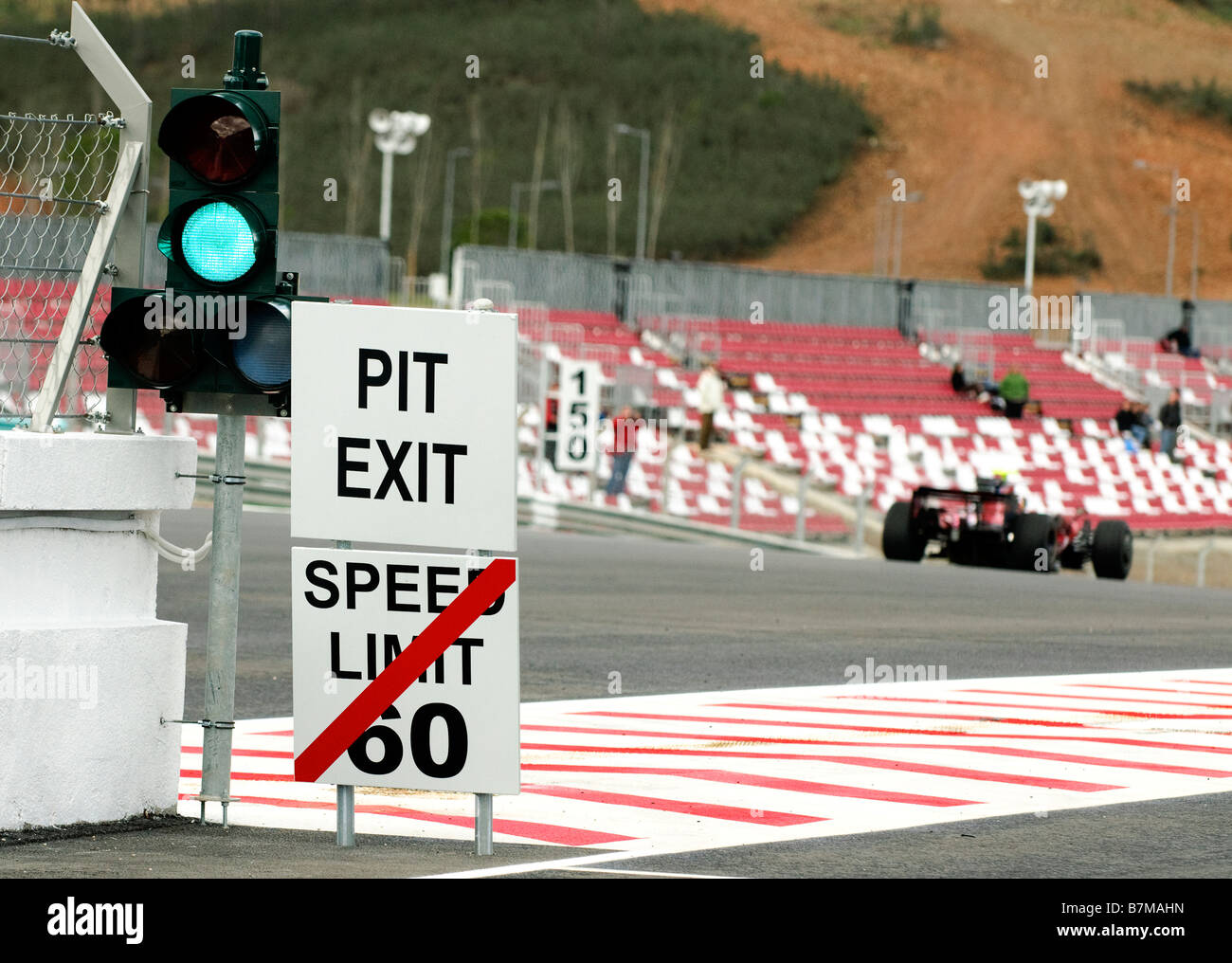 signs displaying speed limit at pit-lane exit of racetrack at Autodromo ...