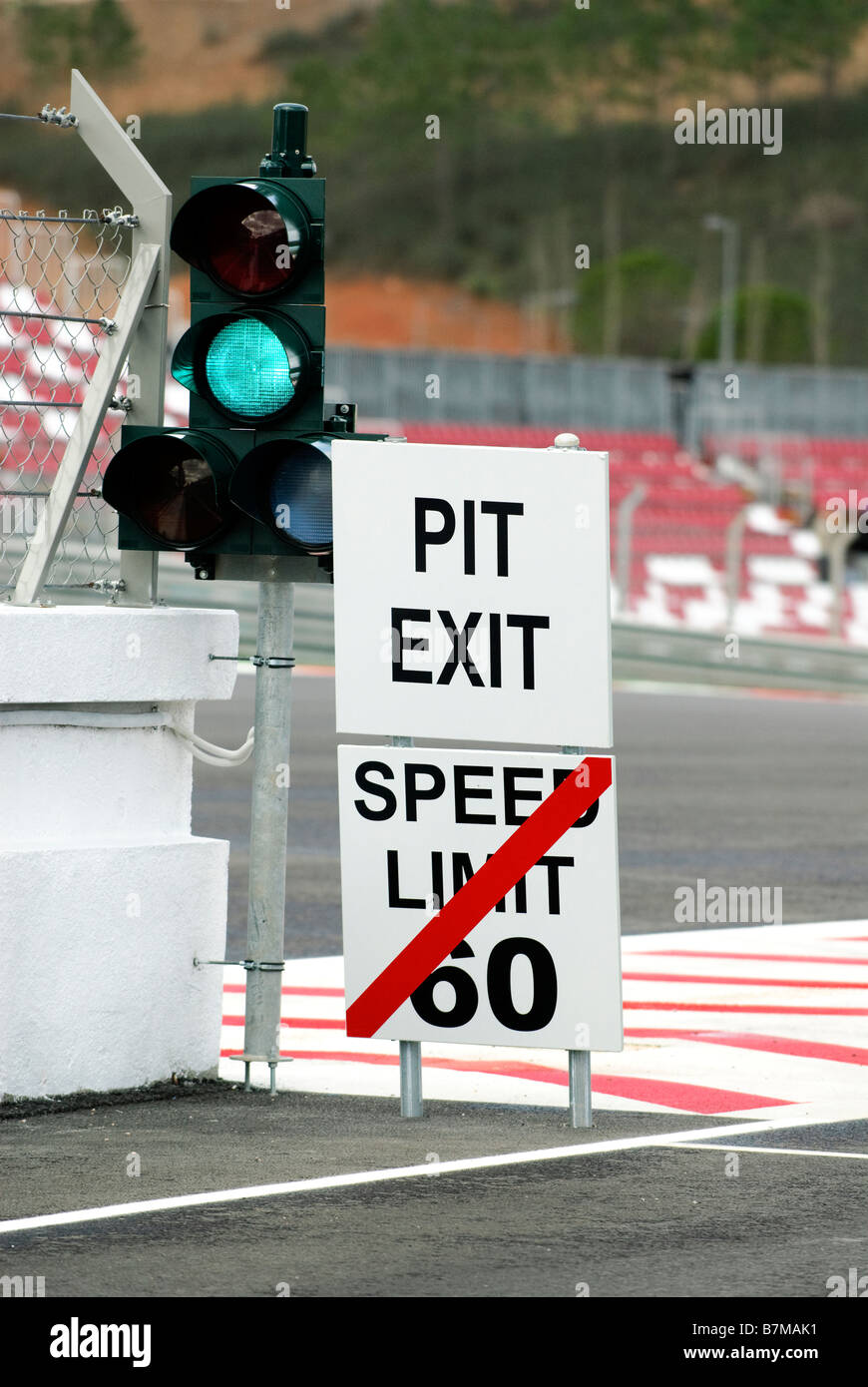 signs displaying speed limit at pit-lane exit of racetrack at Autodromo ...