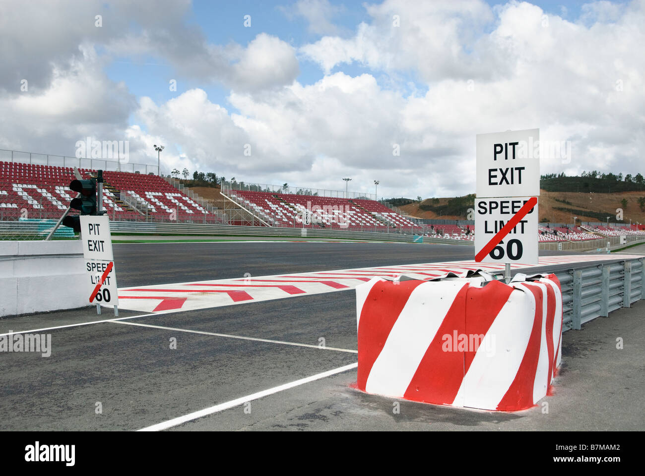 signs displaying speed limit at pit-lane exit of racetrack at Autodromo ...