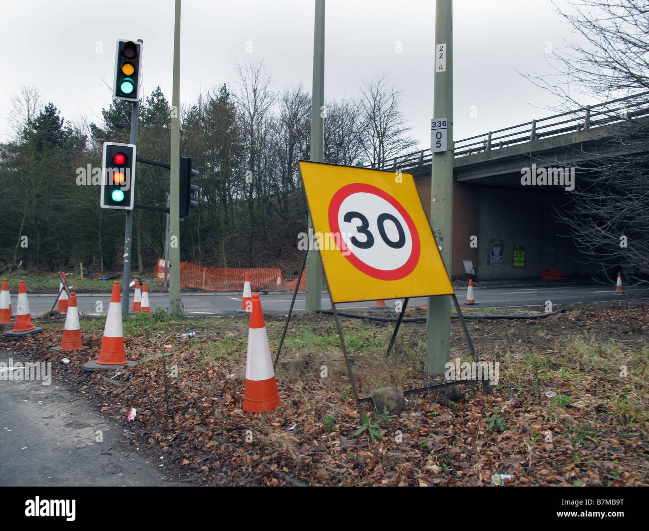 A temporary 30 MPH speed restriction sign at roadworks Stock Photo - Alamy