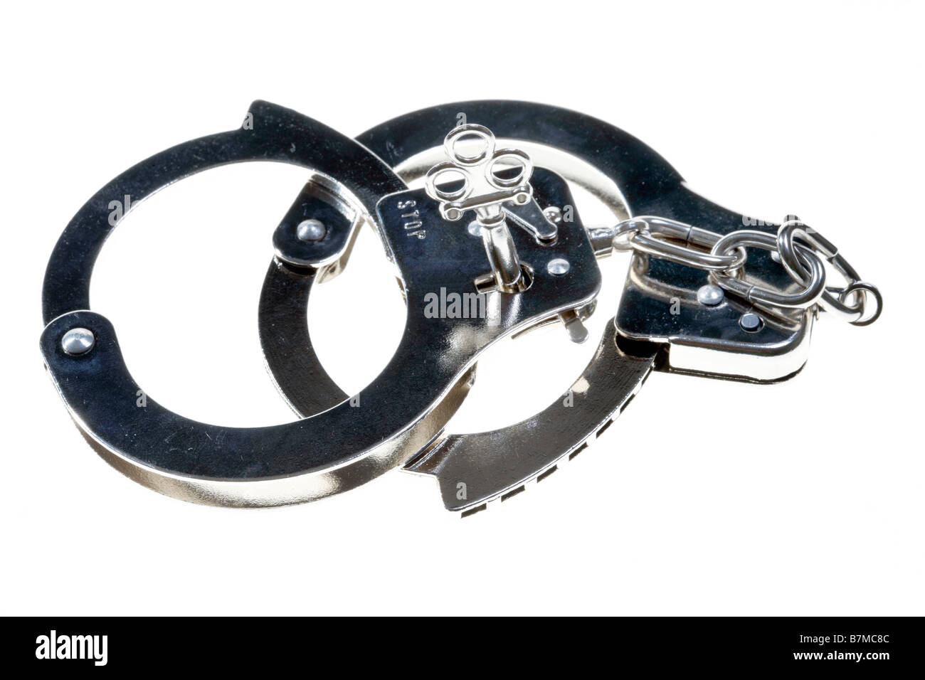 Handcuff Cut Out Stock Images & Pictures - Alamy