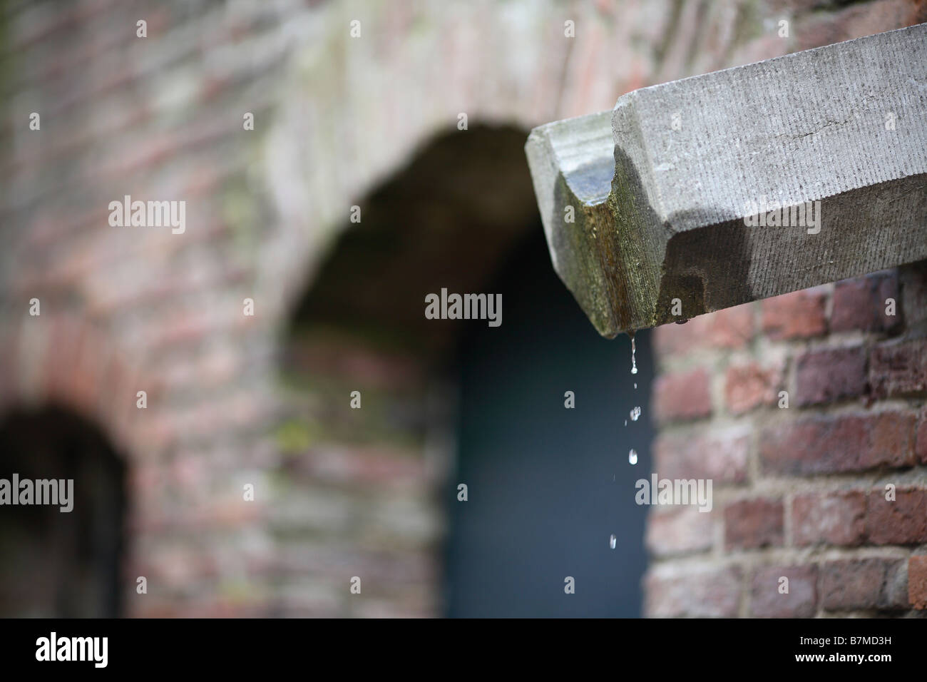 Dripping water feature Stock Photo - Alamy