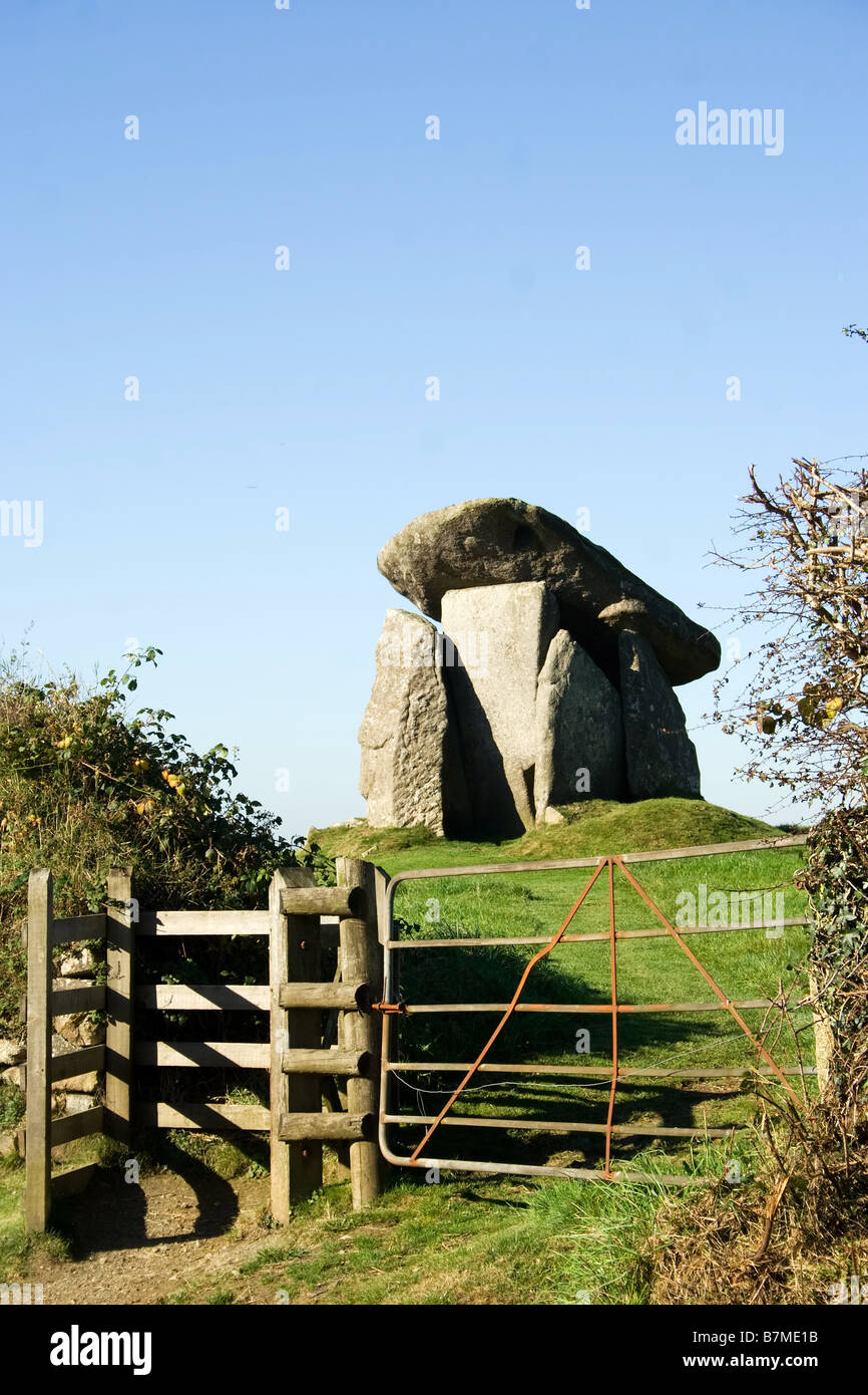 ancient stone monument in grass field with blue sky Stock Photo - Alamy