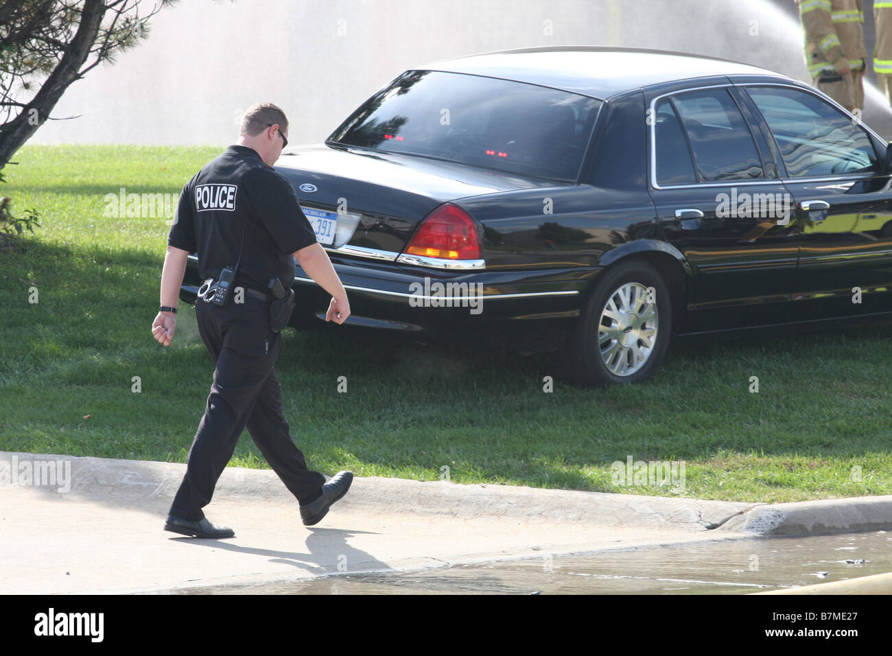 Police respond to a serious industrial fire to secure the scene and ...