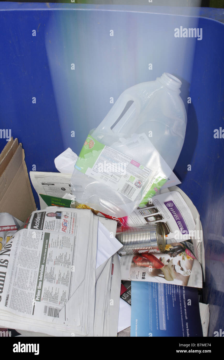 Waste paper falling recycle bin hi-res stock photography and images - Alamy