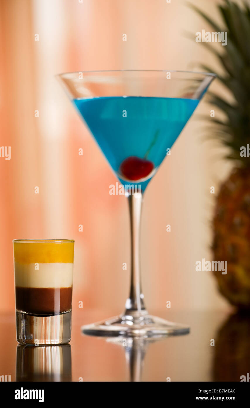 B-52 Shot and Betty Blue Cocktail. Focus on B-52 Stock Photo - Alamy