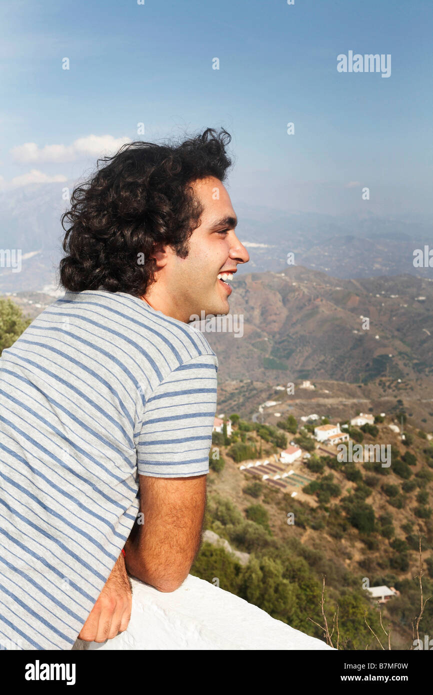 Man looking at view Stock Photo - Alamy