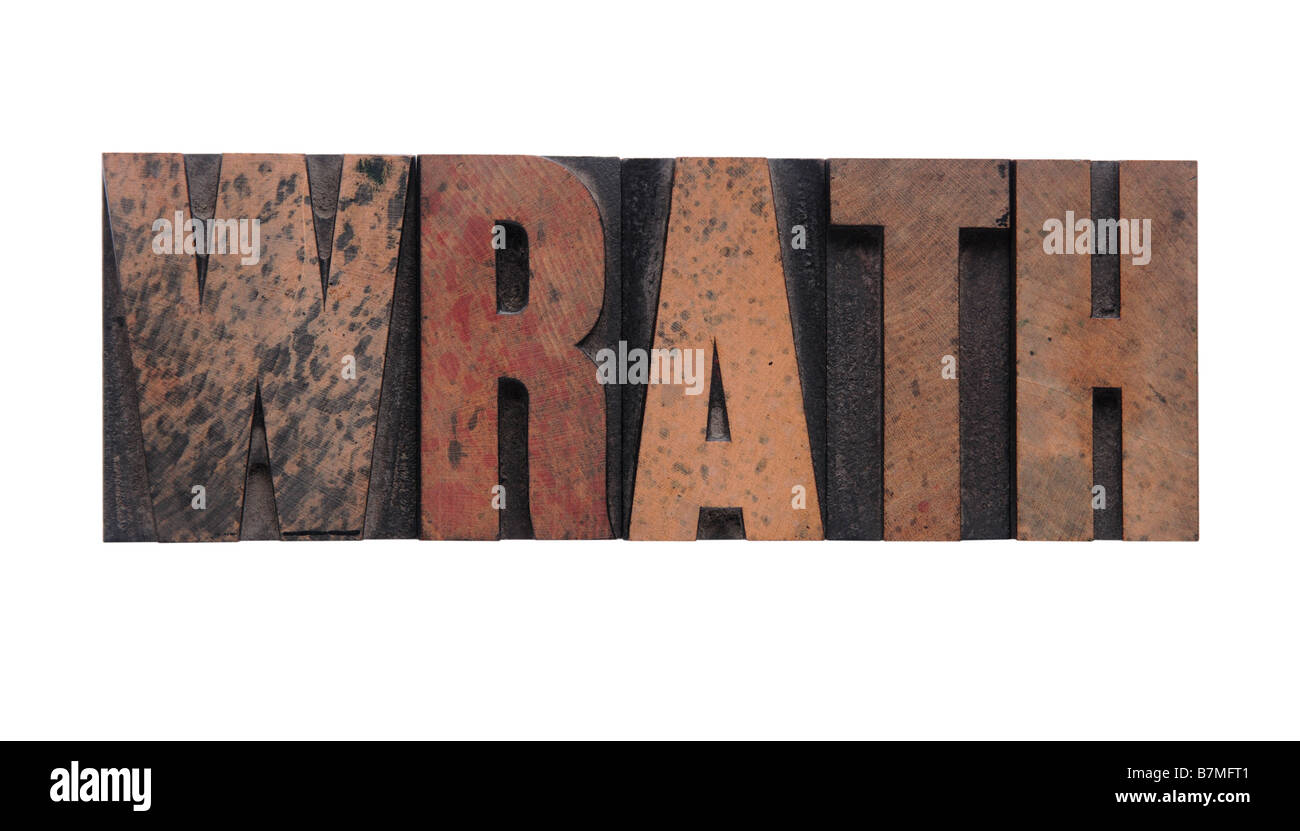 the word 'wrath' in old ink-stained wood type Stock Photo - Alamy