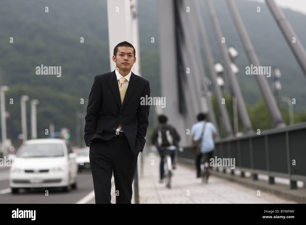 Person standing on a bridge hi-res stock photography and images - Alamy