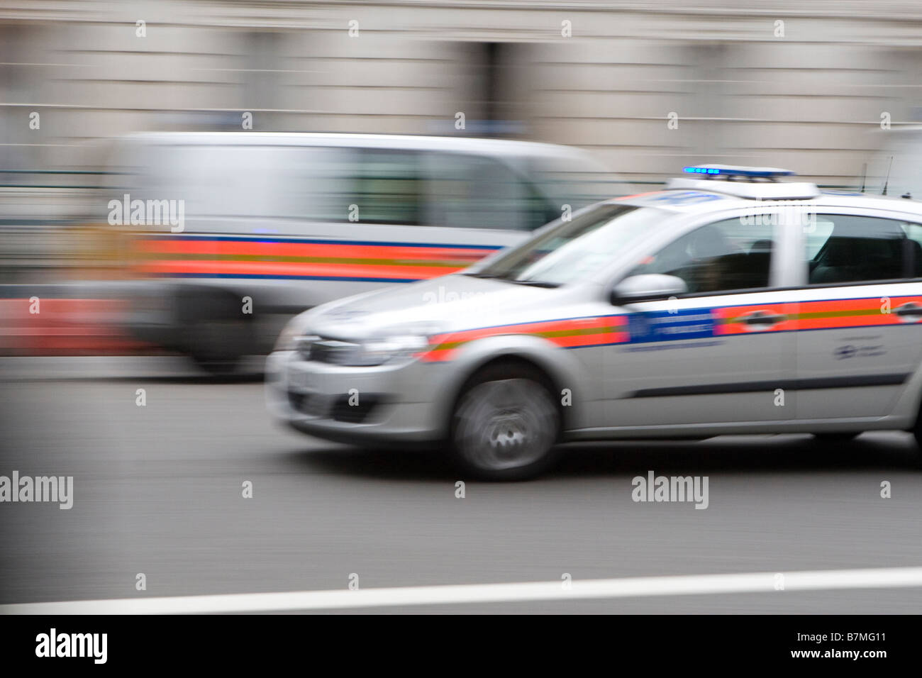 Police car action hi-res stock photography and images - Alamy