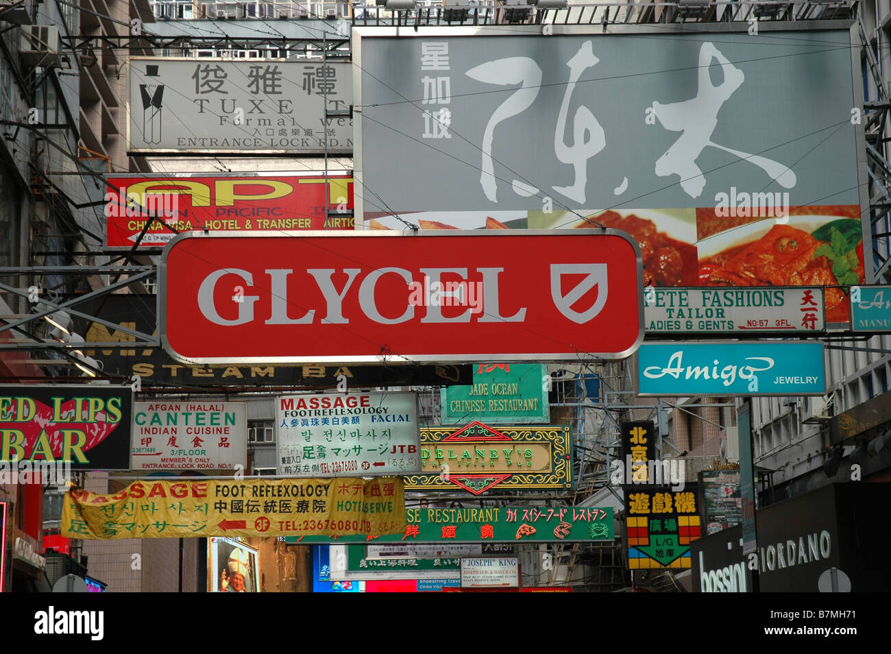 Advertising signs hang over streets in Central, Hong Kong Island, Asia ...