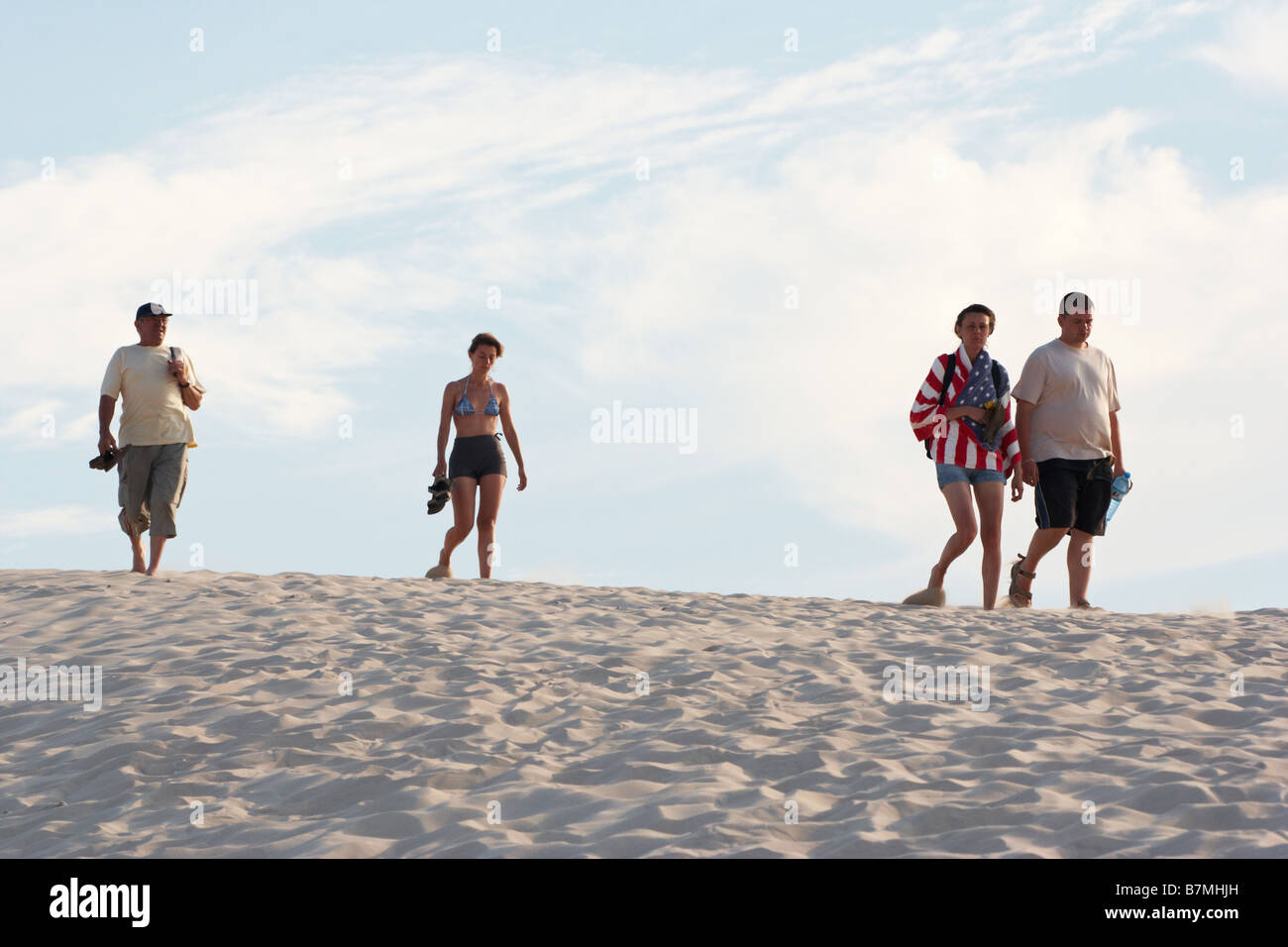 People walking on the dune Slowinski National Park Poland Stock Photo ...