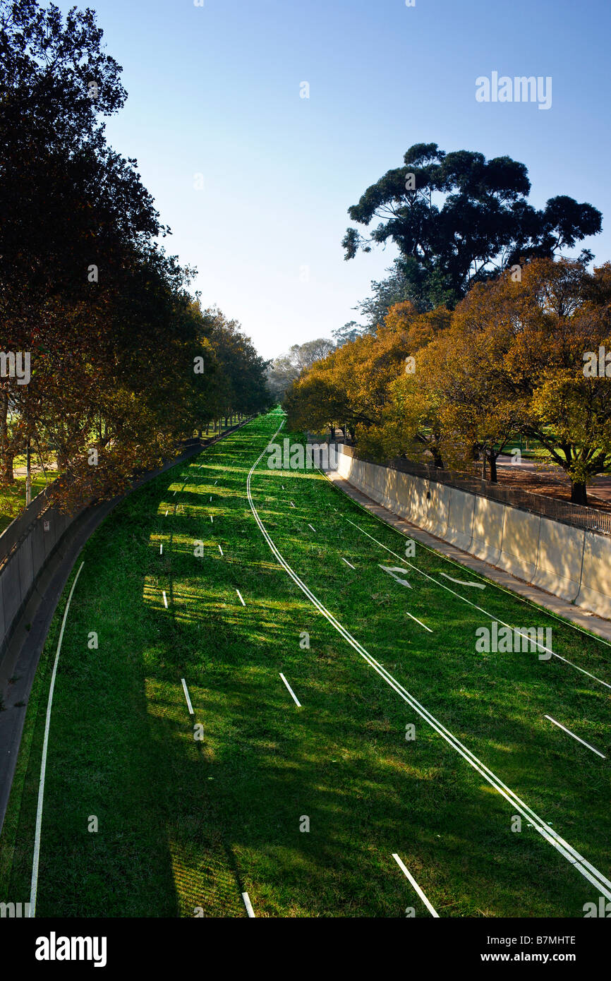 A stock photograph of a highway covered in grass to say good bye to ...