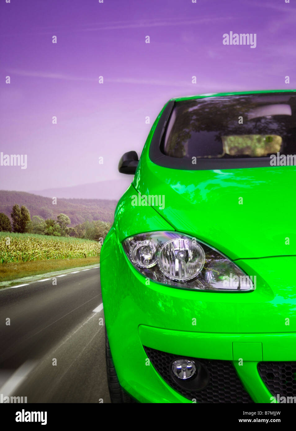 Image of a car viewed from the front on the highway Stock Photo - Alamy