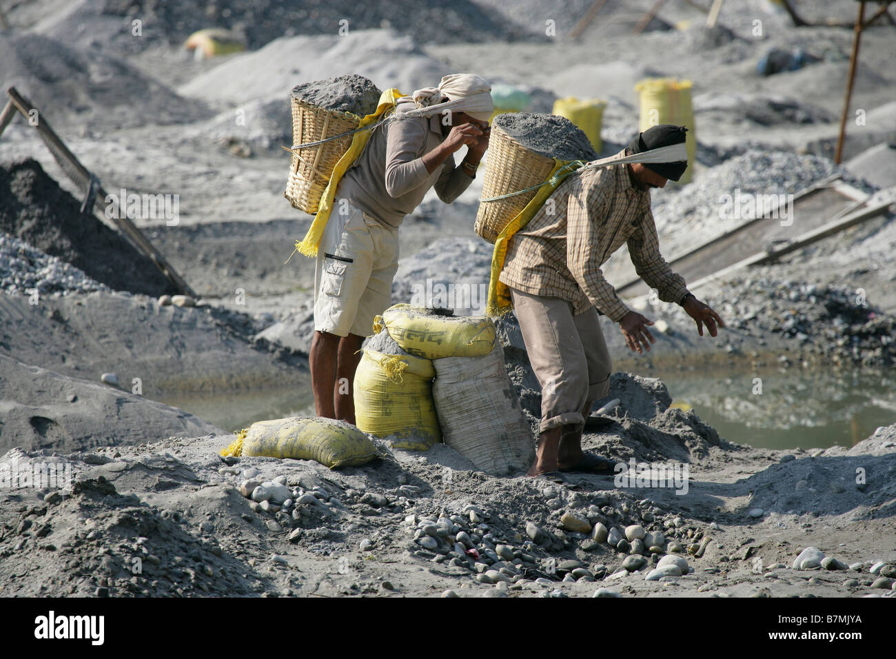 Men quarrying sand Stock Photo - Alamy