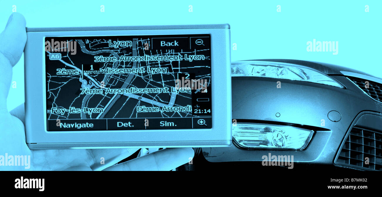 GPS Vehicle navigation system in a man hand Stock Photo - Alamy