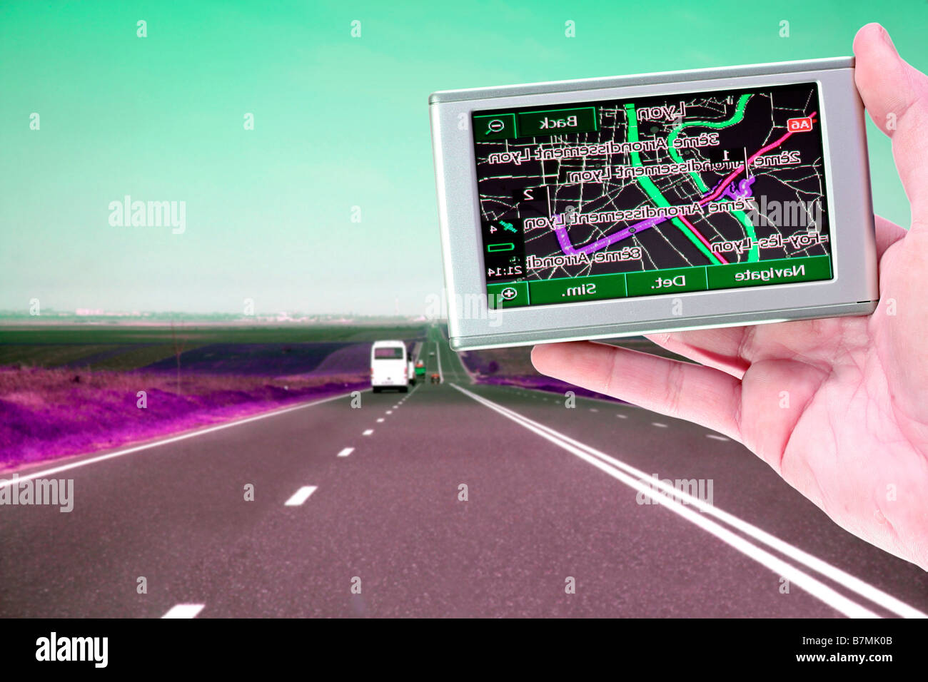 GPS Vehicle navigation system in a man hand Stock Photo - Alamy