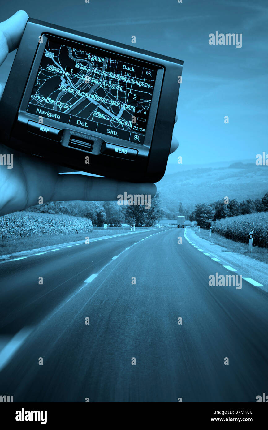 GPS Vehicle navigation system in a man hand Stock Photo - Alamy