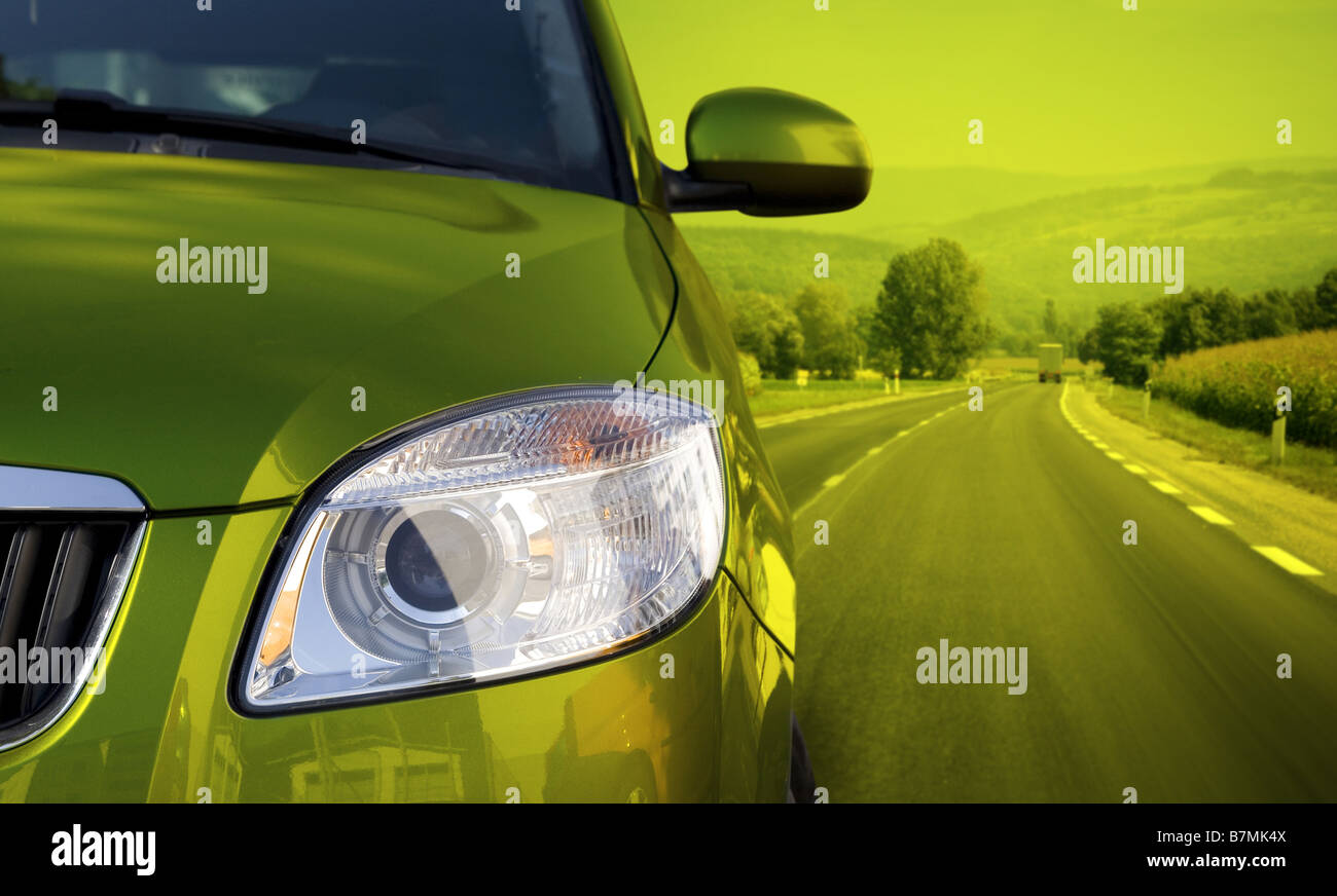 Yellow car on the road Stock Photo - Alamy
