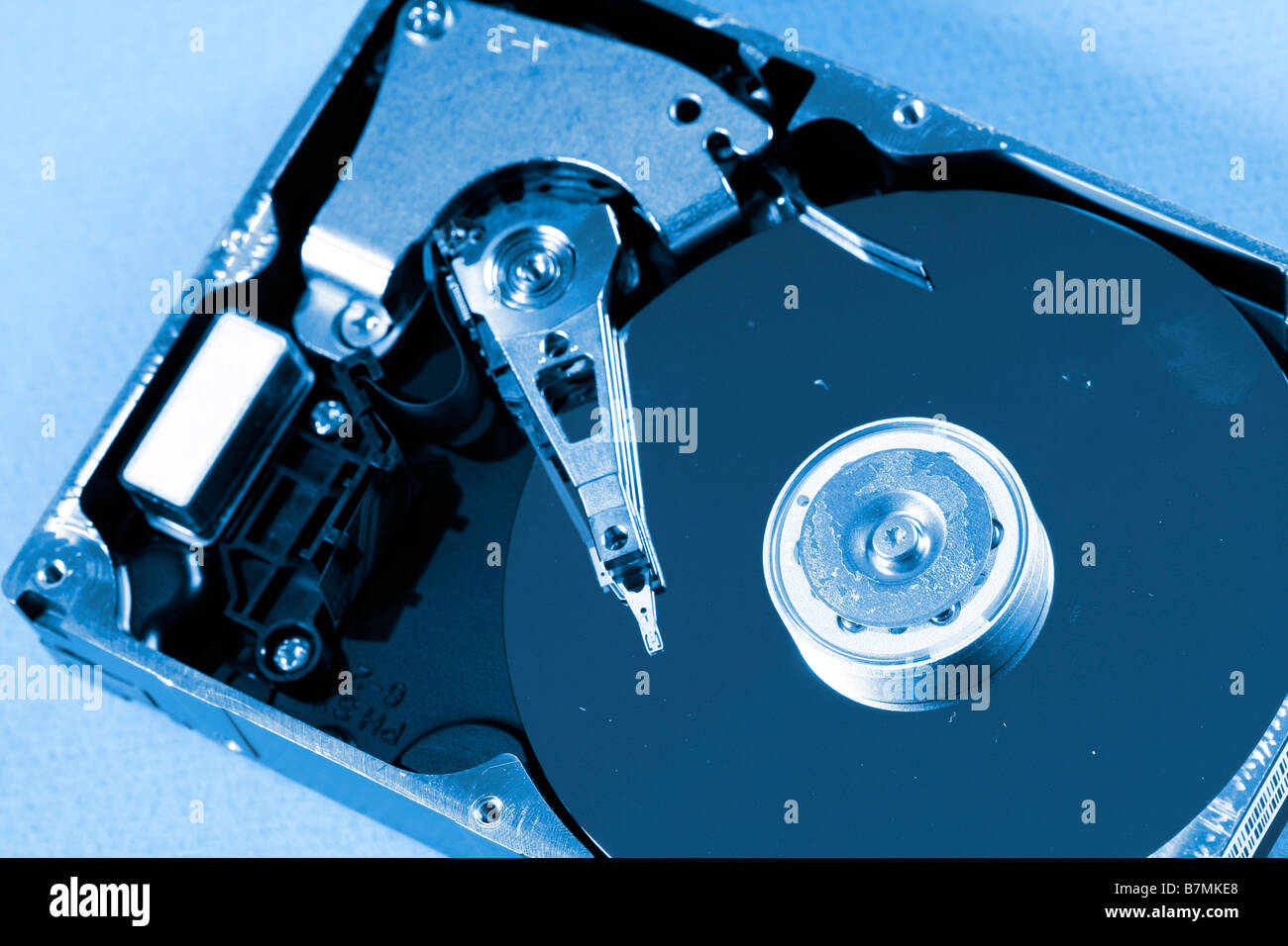 Close-up picture of a hdd with blue reflections Stock Photo - Alamy