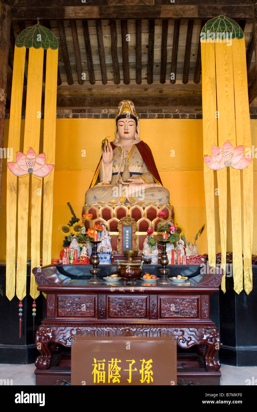 The fire god at Chenghuang Miao Tao temple in Xian in China Stock Photo ...