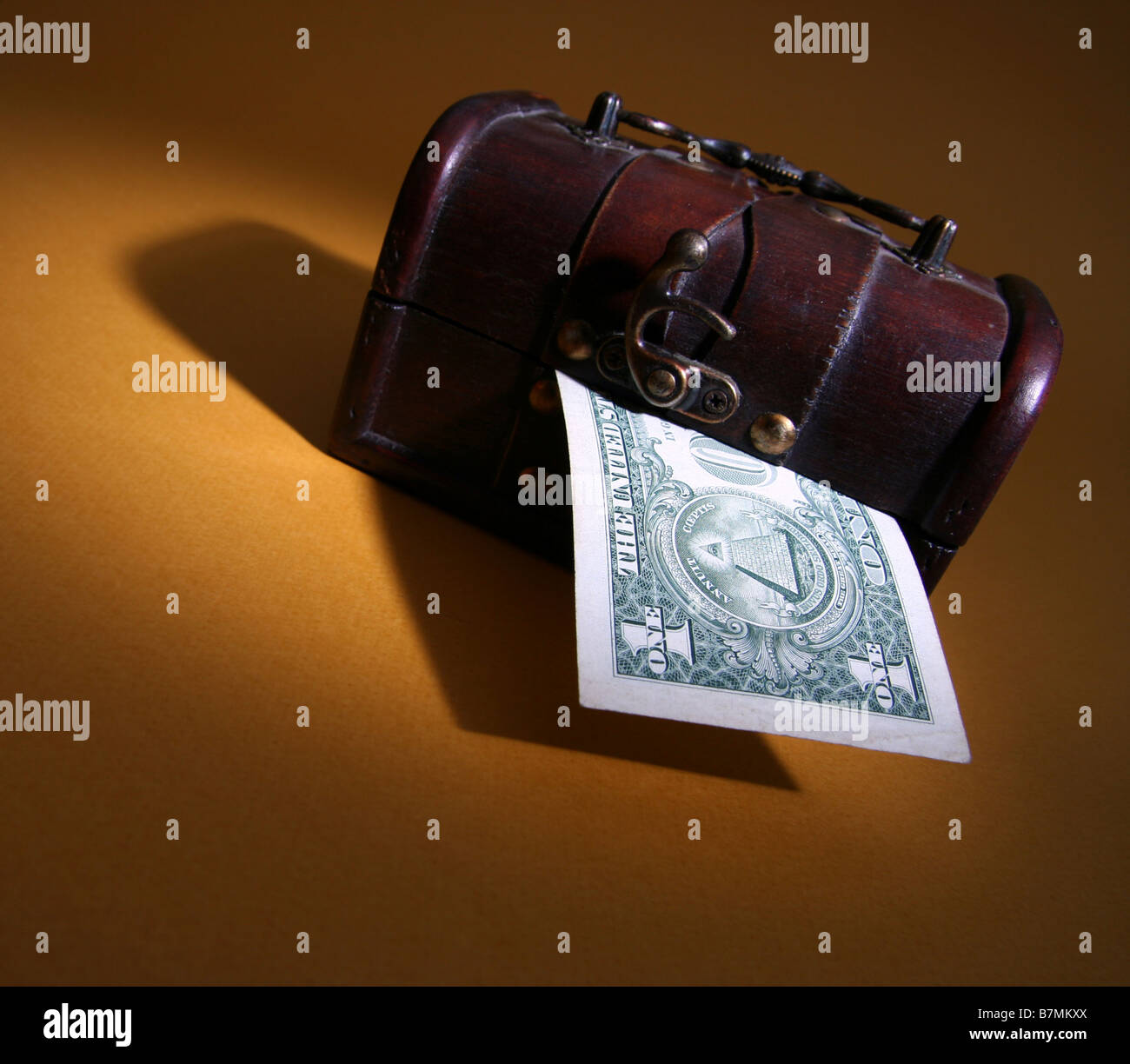 Wood cashbox isolated on brown Stock Photo - Alamy