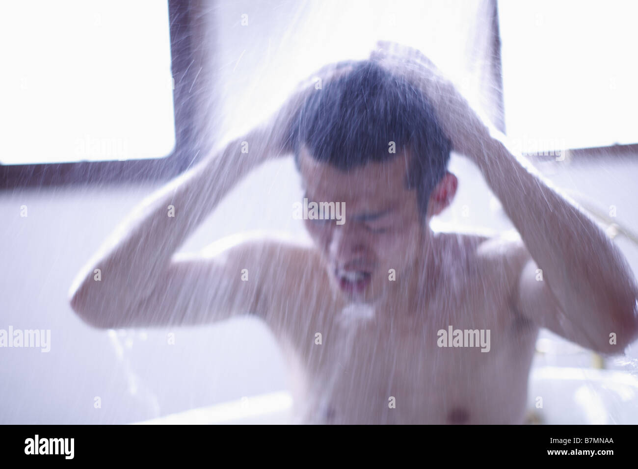 Man Taking a Shower Stock Photo - Alamy