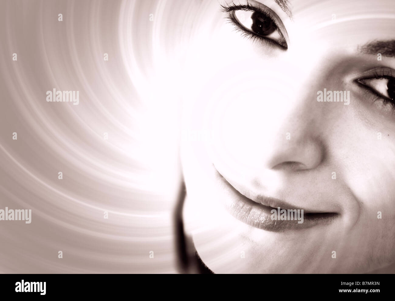 Woman face over ray of light background Stock Photo - Alamy
