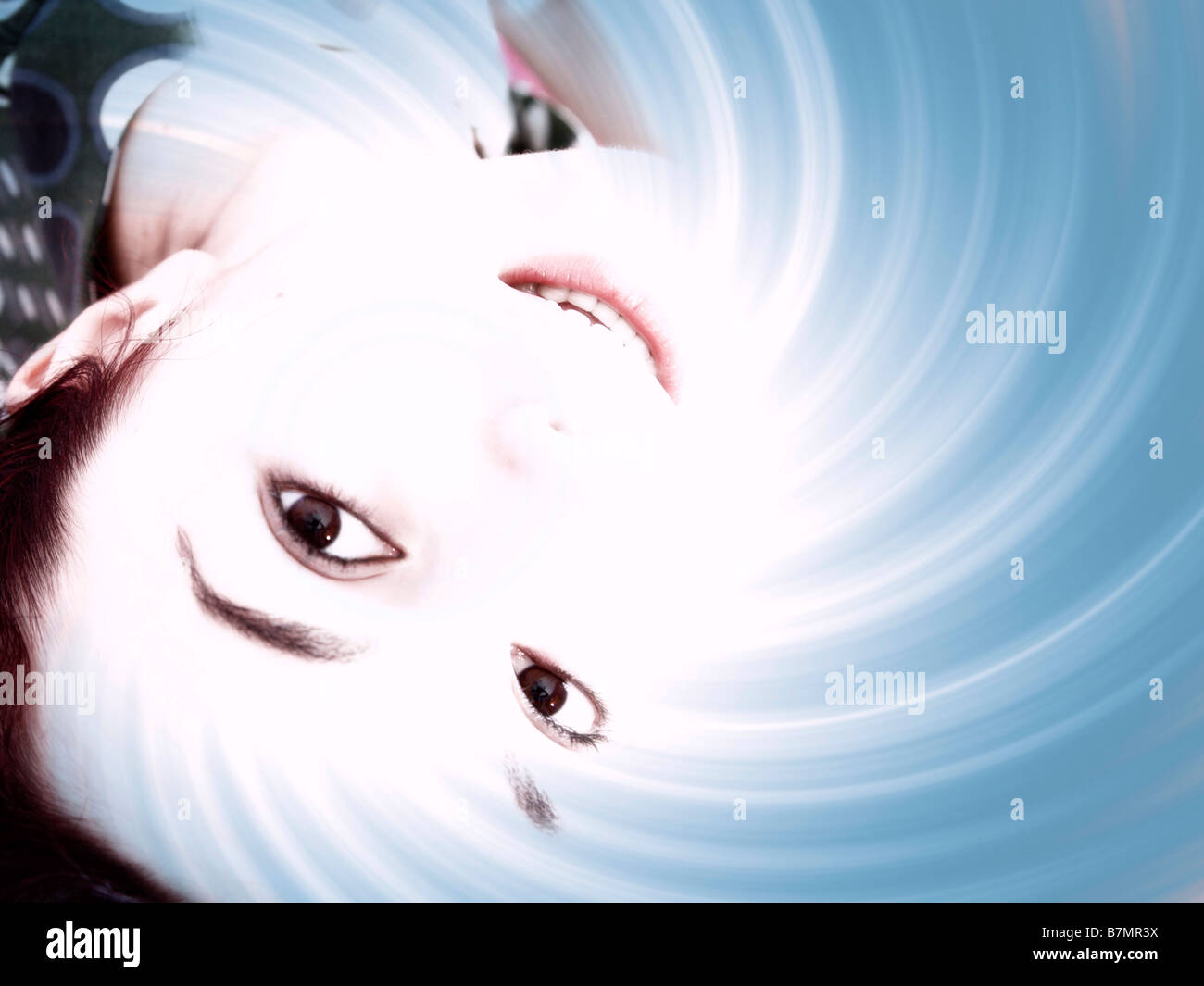 Woman face over ray of light background Stock Photo - Alamy