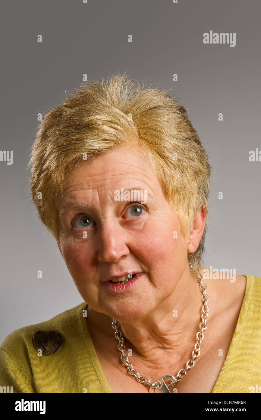 Portrait of a mature woman with quizzical expression Stock Photo - Alamy