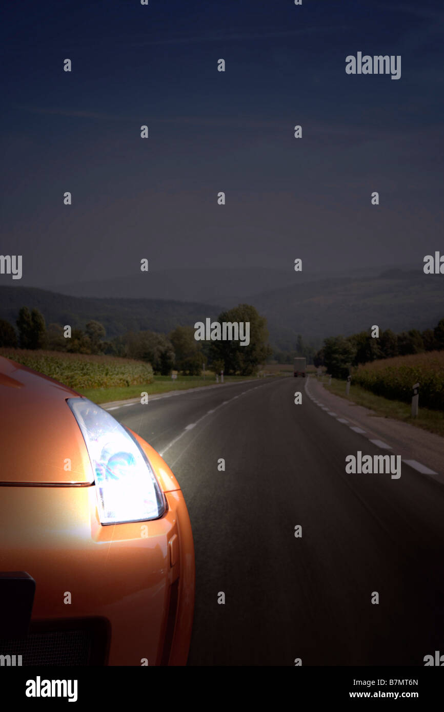 Car on the road view from the front Stock Photo - Alamy