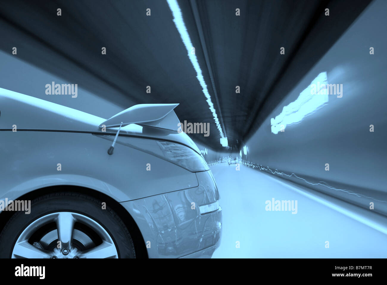 Car on the road view from the lateral Stock Photo - Alamy