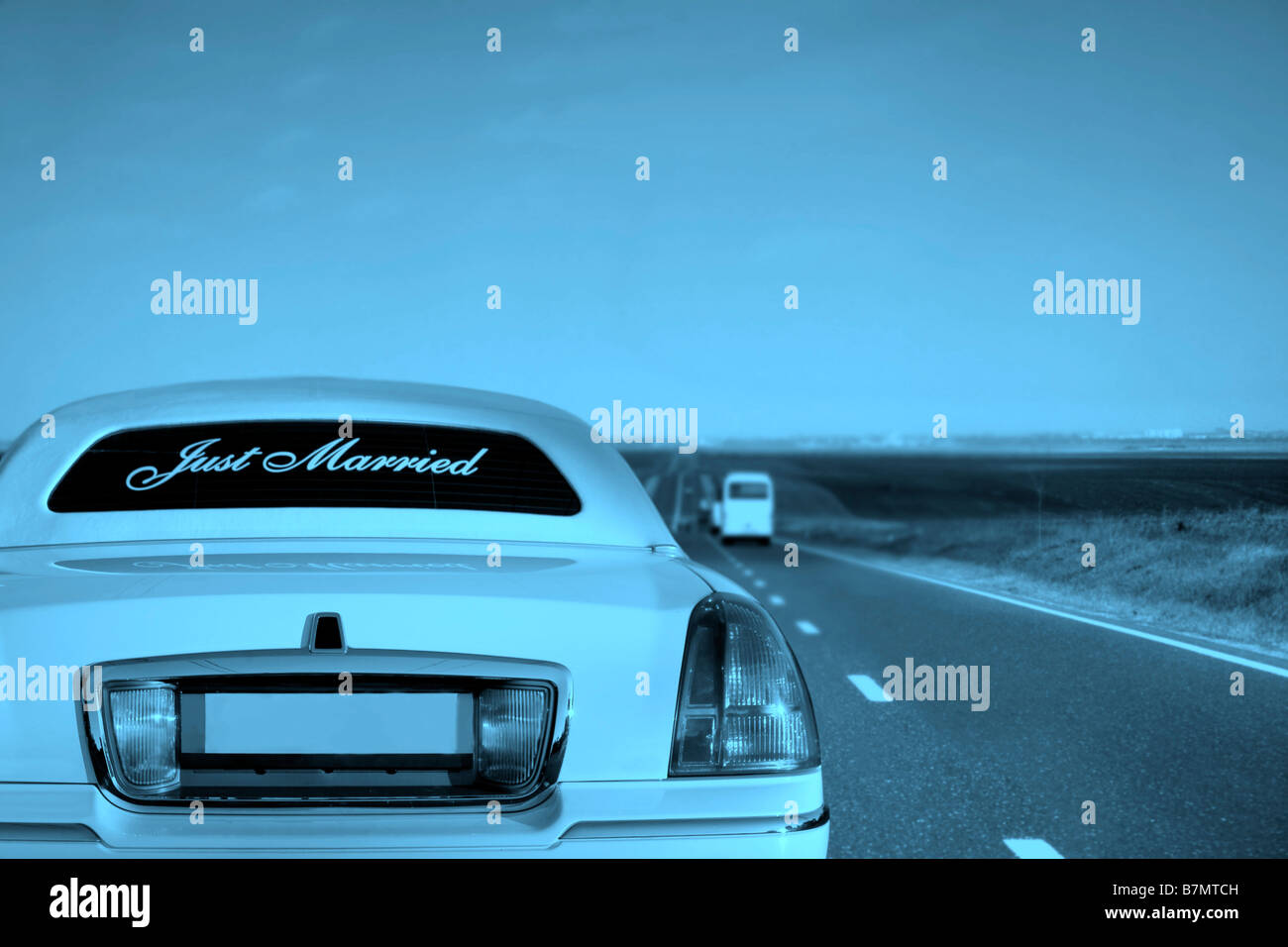 Car on the highway View from the back Stock Photo - Alamy