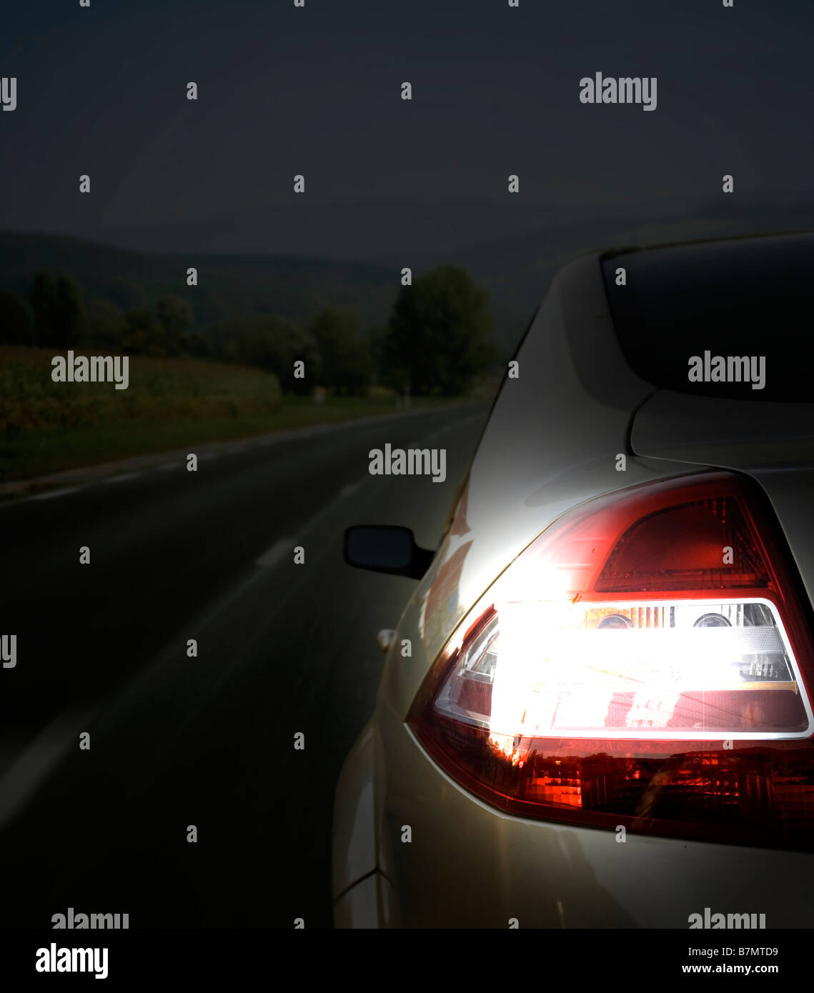 Silver car on the road Stock Photo - Alamy