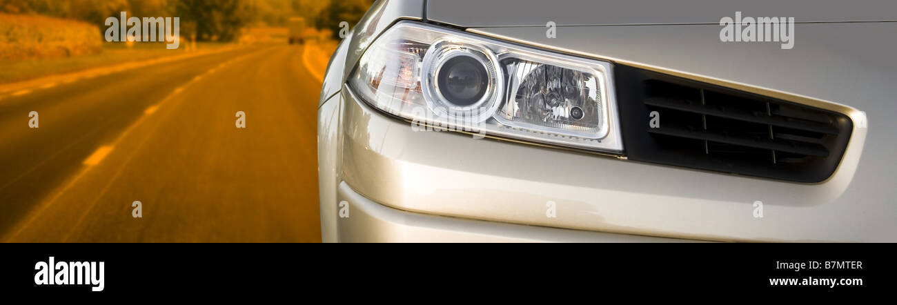 Silver car on the road Stock Photo - Alamy