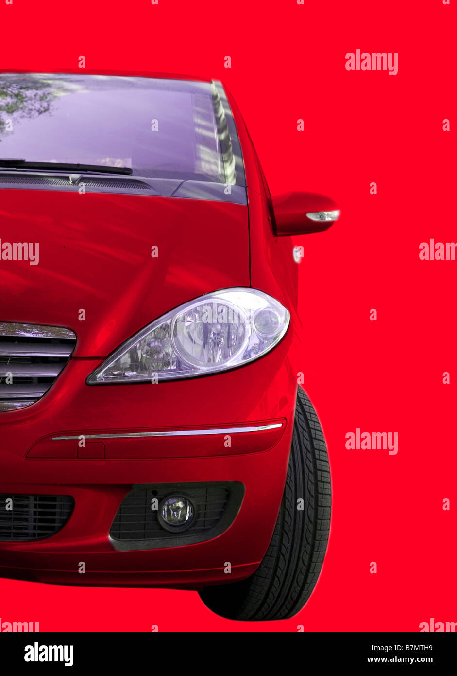 Red car isolated on red Stock Photo - Alamy
