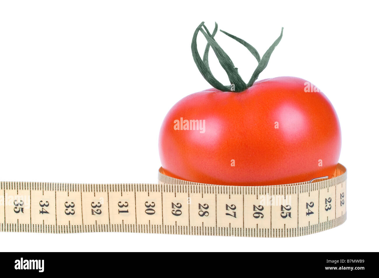 Fresh tomato measuring tape on Cut Out Stock Images & Pictures - Alamy