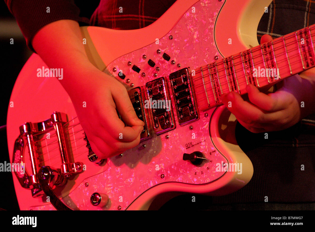 Electric guitar player Stock Photo - Alamy