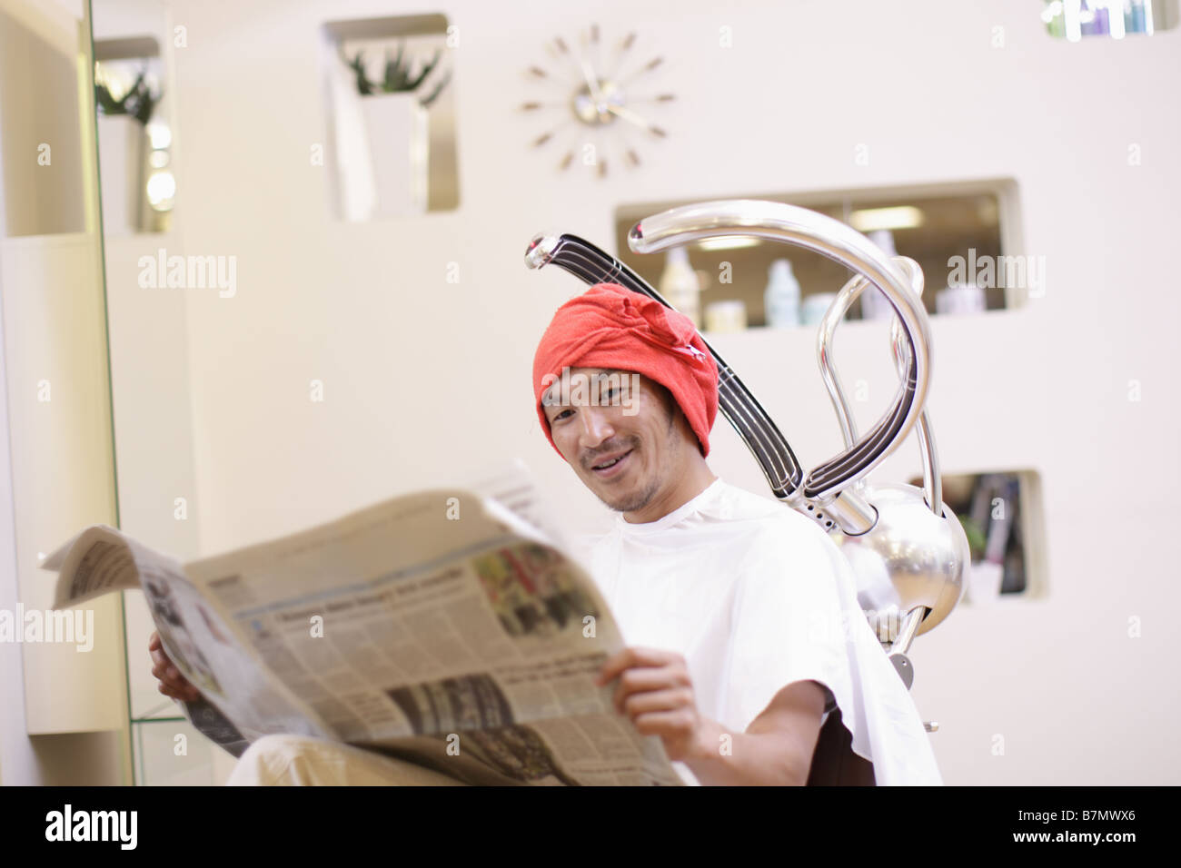 Man Getting His Hair Set in a Salon Stock Photo - Alamy