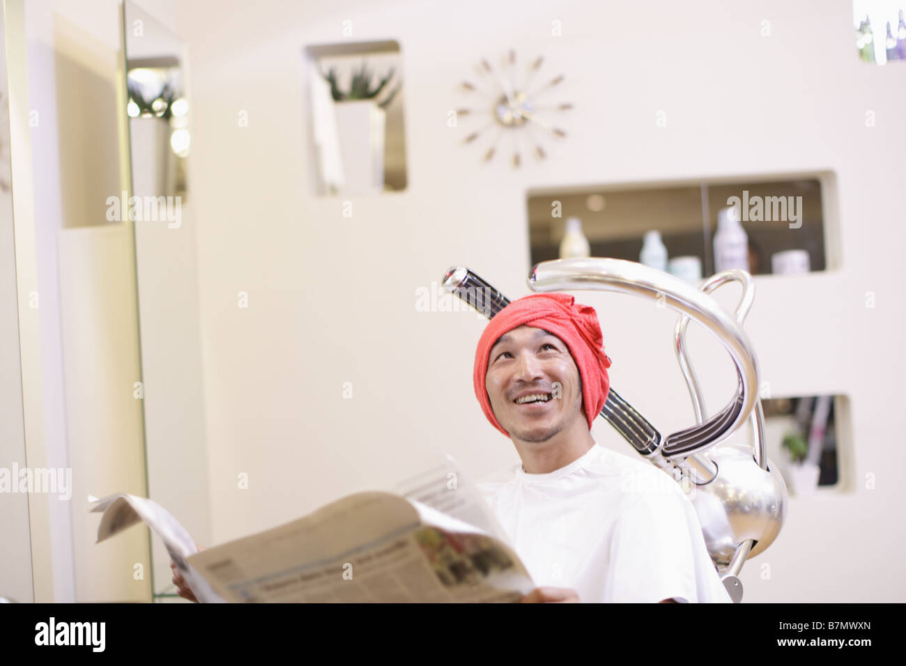 Man Getting His Hair Set in a Salon Stock Photo - Alamy