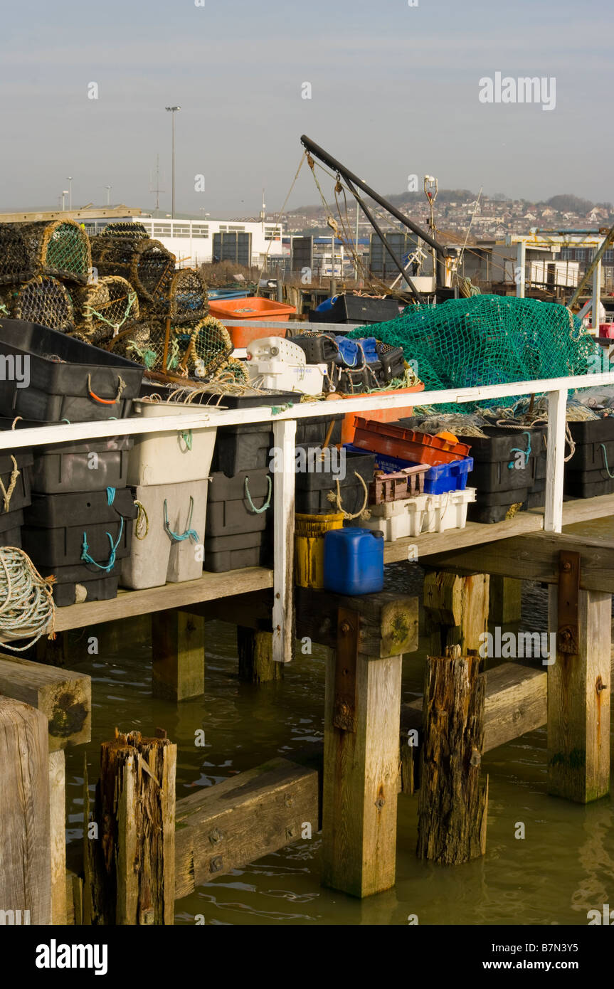 Jetty with several many lots stack pile Lobster Pots and Catch ...
