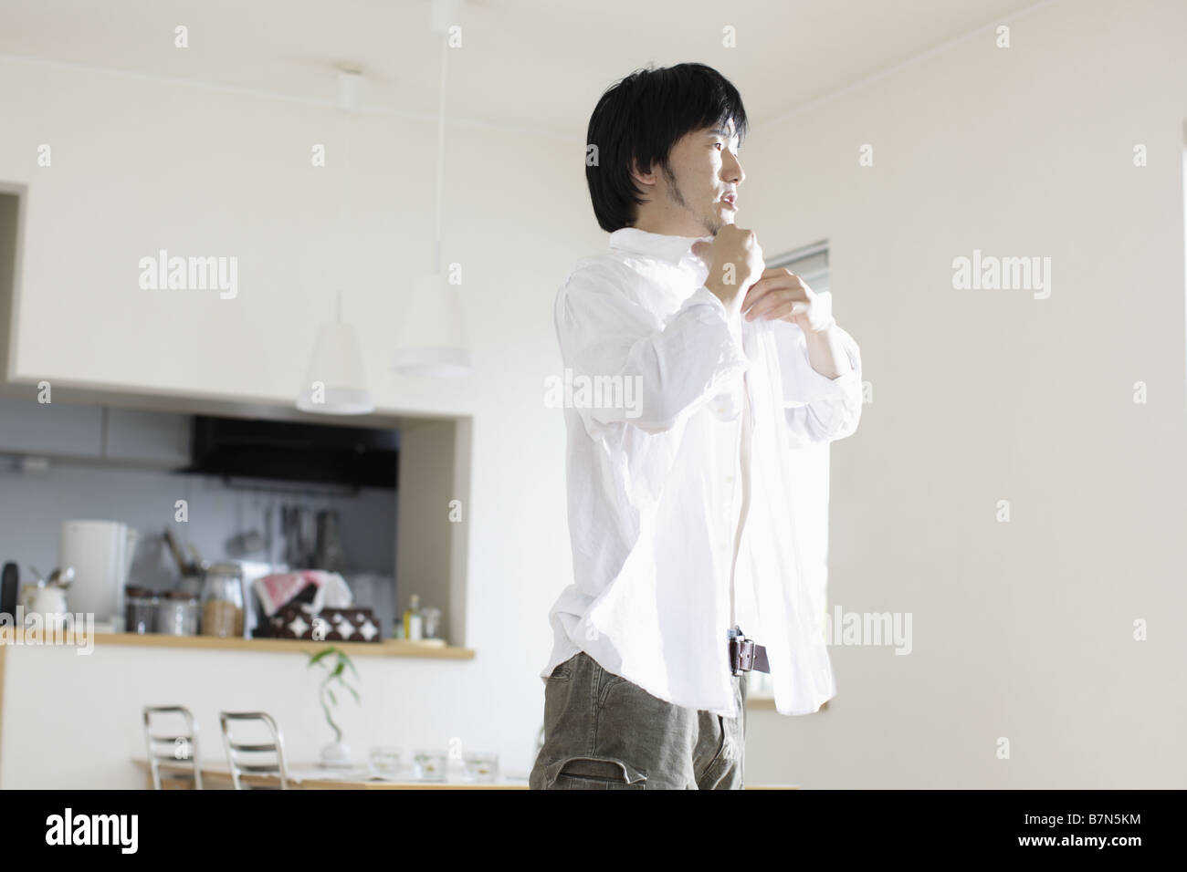 Man Getting Dressed Stock Photo - Alamy