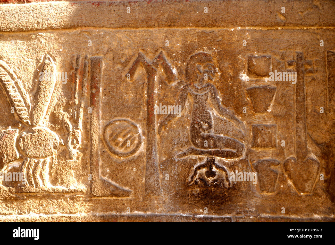 Hieroglyph of woman giving birth at the temple to Crocodile God Sobek ...