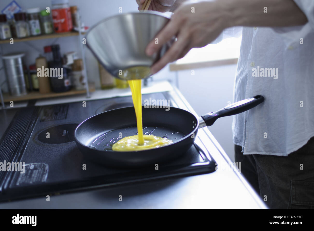 Man Cooking in Kitchen Stock Photo - Alamy