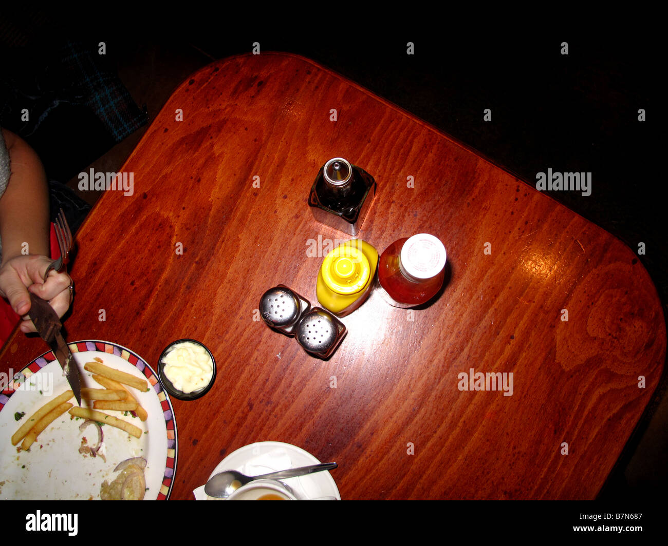 Condiments on restaurant table Stock Photo - Alamy