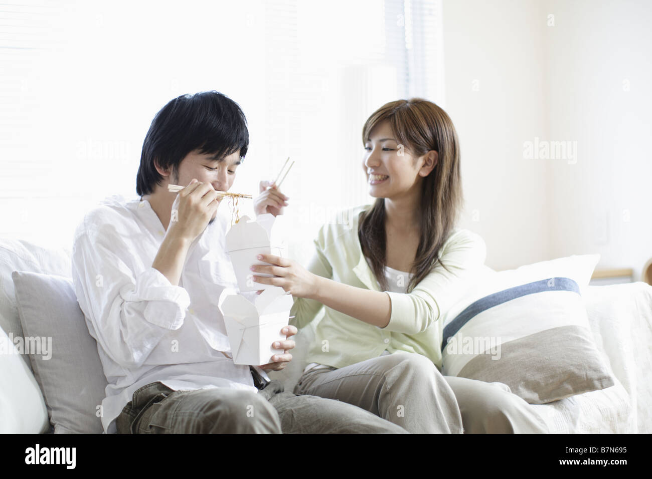 Couple Having a Lunch Break Stock Photo - Alamy